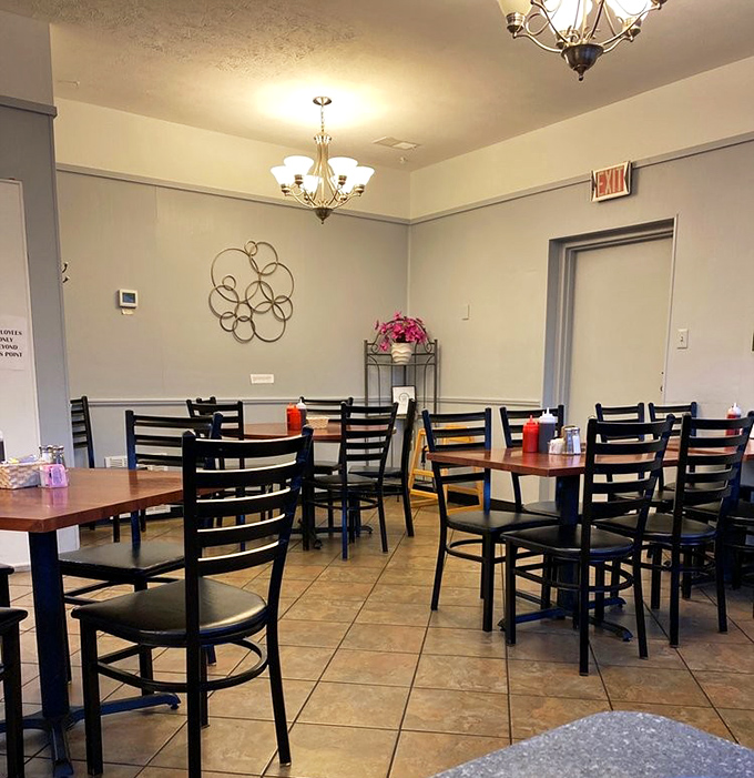 Simple elegance meets homestyle comfort in L'Dees dining room, where chandeliers cast a warm glow over conversations and coffee refills.