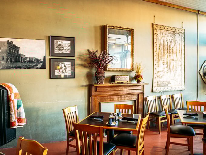 Historic photos and warm wood furnishings create an atmosphere that's equal parts small-town charm and timeless steakhouse elegance.