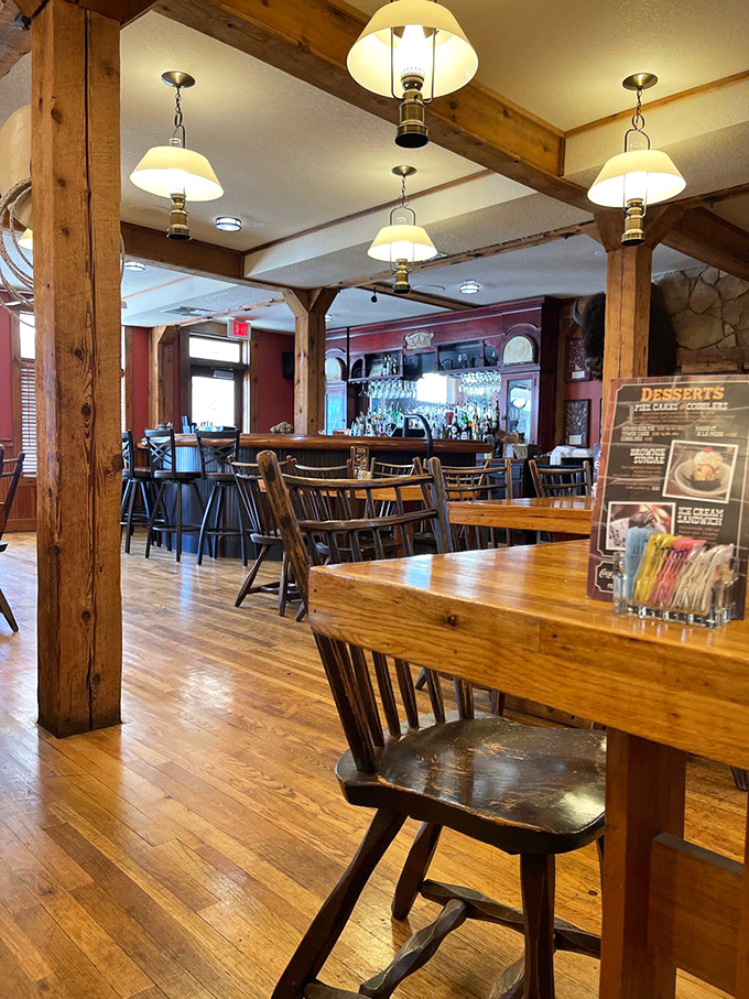 Exposed wooden beams and warm lighting create that perfect "come stay awhile" atmosphere where conversations flow as freely as the drinks.