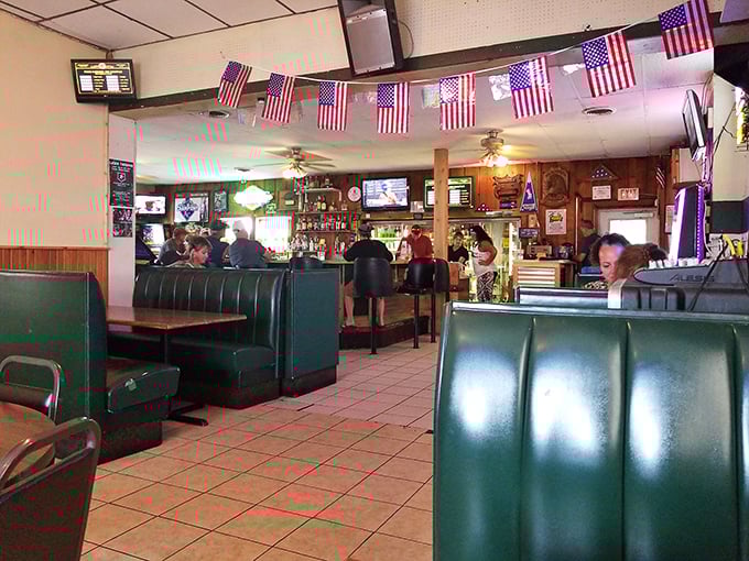Step inside and the American flags, green vinyl booths, and wood paneling tell you everything: authenticity trumps trendiness here, and that's precisely the point.