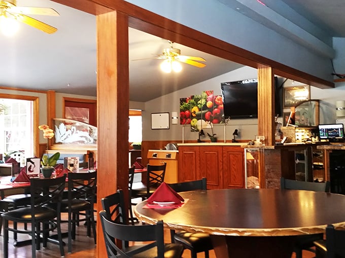 Inside, warm wood tones and thoughtful lighting create that perfect supper club atmosphere where memories are made between bites.