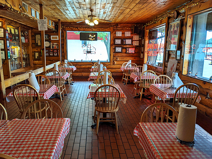 Step inside and time slows down&mdash;wooden walls, checkered tablecloths, and the promise of smoky delights in this cabin-like sanctuary dedicated to proper barbecue.