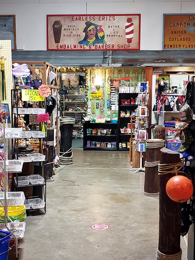 "Earless Eric's Embalming & Barber Shop" sign perfectly captures the quirky humor that makes this place more than just another antique store.