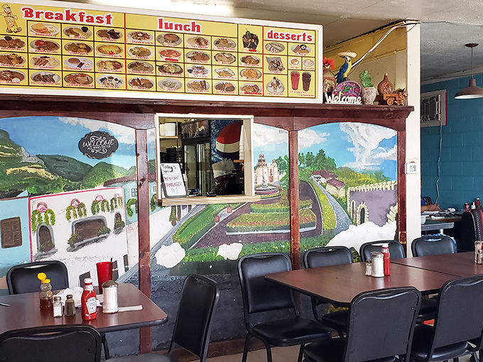 Inside, hand-painted murals and a no-nonsense menu board create the kind of authentic atmosphere money can't manufacture but appetite immediately recognizes.
