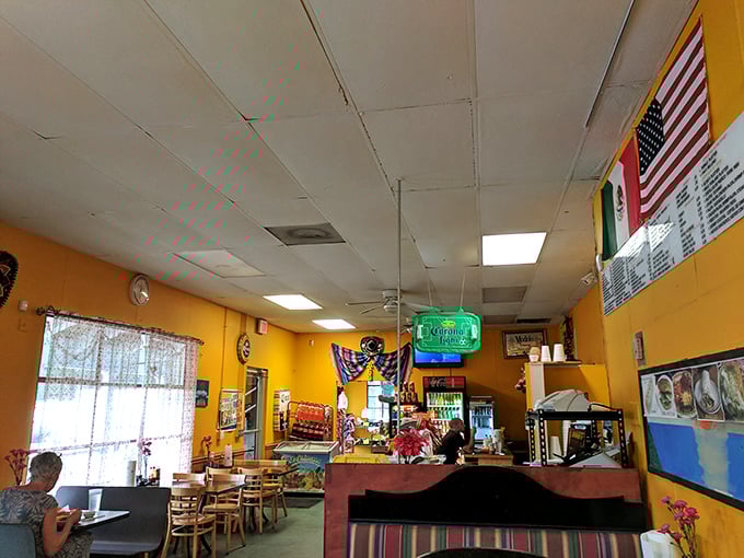 Cheerful yellow walls and colorful decorations transport you straight to Mexico, while the American flag reminds you that great food knows no borders.