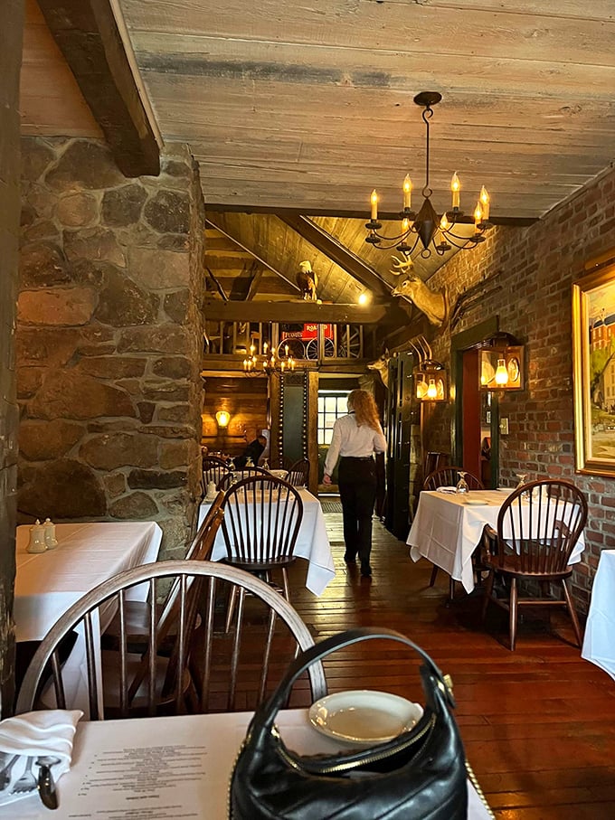 Step inside and time slows down—exposed brick walls, wooden beams, and candlelight chandeliers create an atmosphere that whispers stories from centuries past.