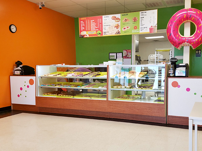 Vibrant orange and green walls create a cheerful backdrop for the main attraction&mdash;a display case that practically whispers, "Resistance is futile."