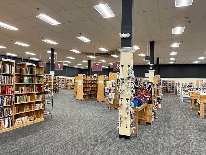 Numbered sections hanging from the ceiling like literary street signs &ndash; the dewey decimal system meets urban planning for bibliophiles.