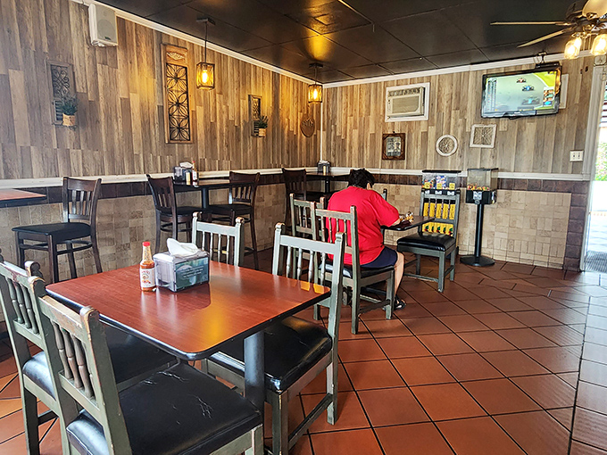 Warm wood paneling and simple furnishings create that perfect "neighborhood spot" vibe. No pretension here&mdash;just a comfortable place where the food takes center stage.