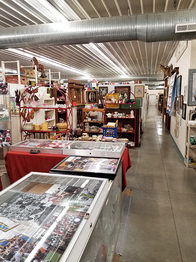 Long corridors lined with treasures stretch before you, each booth a miniature museum curated by collectors with distinct passions and specialties.