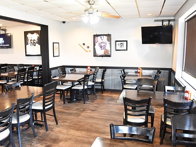 Sports memorabilia and corrugated metal wainscoting create that perfect "come as you are" vibe where both farmers and foodies feel equally at home.