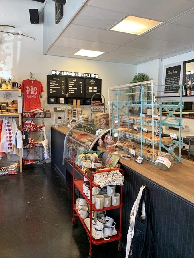 Pie paradise awaits inside with shelves of freshly baked treasures. The "Pie for the People" sign isn't just cute—it's practically a manifesto for deliciousness.