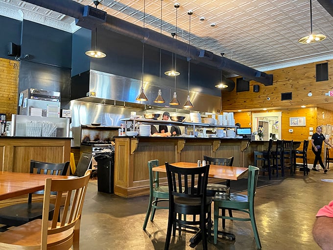 Where breakfast dreams come true: The Bluebird's open kitchen and warm wood interior create the perfect stage for morning magic to unfold.