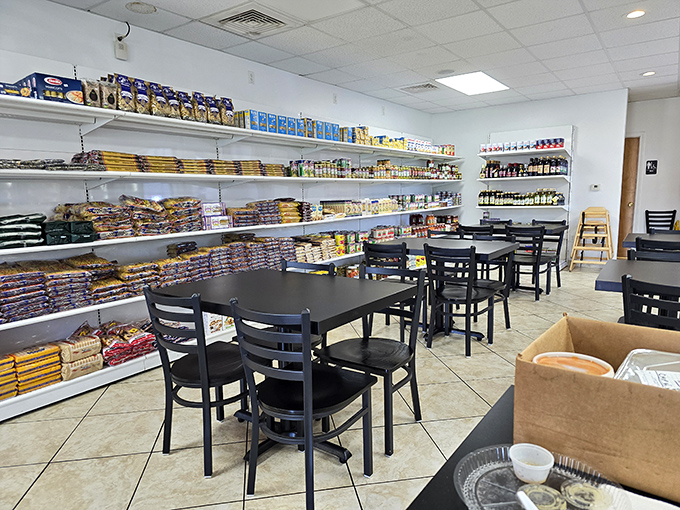 Where grocery shelves meet dining tables in perfect harmony. This no-frills interior promises one thing: the focus here is squarely on the food.