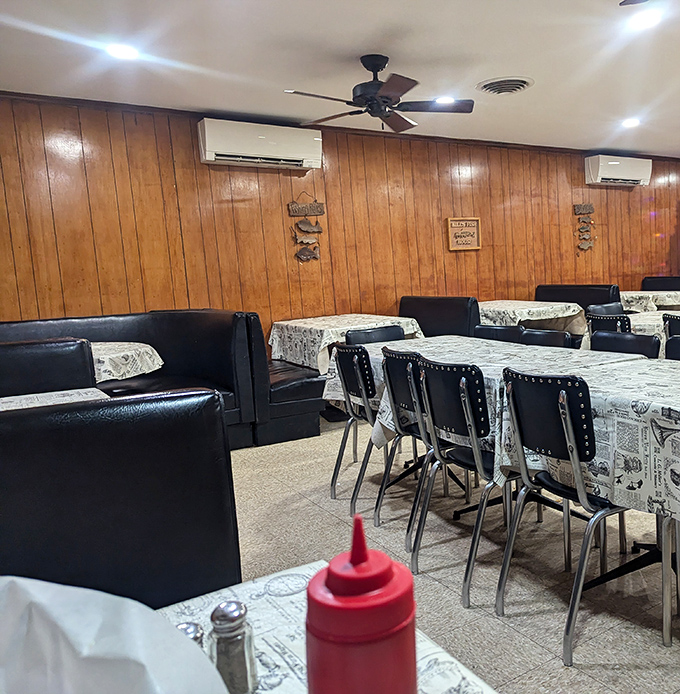 Classic wood paneling and no-nonsense tables set the stage for the real star&mdash;the food. This isn't Instagram decor; it's authenticity you can taste.