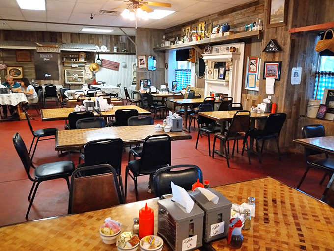 Simple wooden tables, rustic paneling, and an atmosphere free from digital distractions—this dining room invites you to slow down and remember what conversation over a good meal feels like.