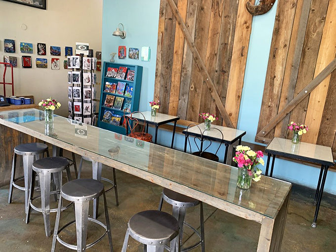 Rustic meets chic in this cozy interior. The reclaimed wood walls and fresh flowers create the perfect backdrop for your inevitable sugar-induced euphoria.