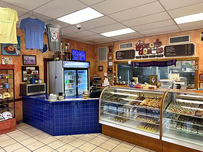 Inside Gibson's, the blue-tiled counter and well-worn display cases speak a universal truth: the best places don't need fancy decor when the food speaks volumes.