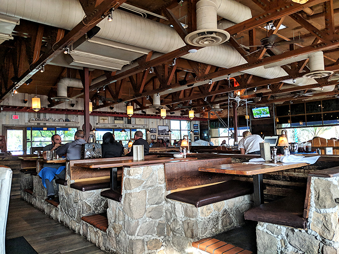 Exposed wooden beams and stone-based booths create that perfect "upscale fishing lodge" atmosphere. Like a mountain cabin that somehow caught an ocean breeze.