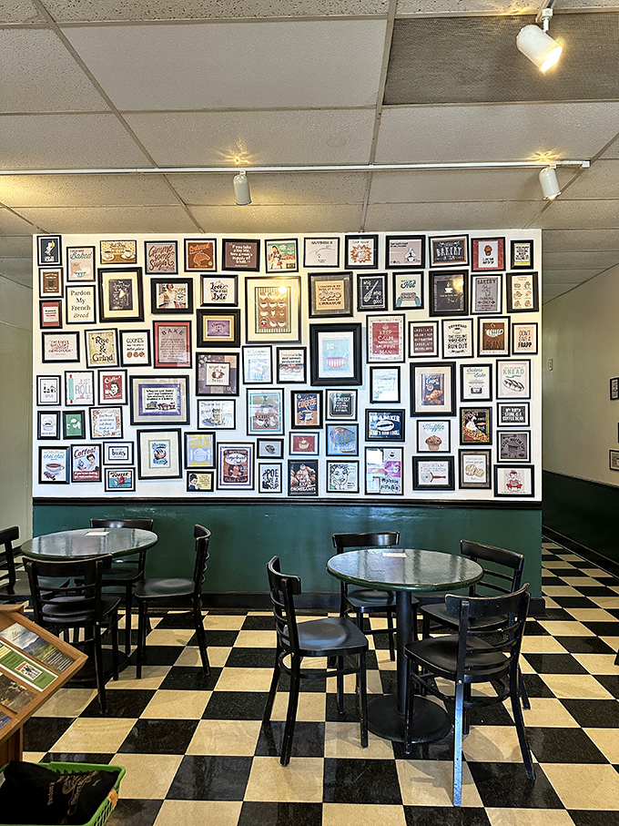 A gallery wall of food quotes and artwork creates the perfect backdrop for carb-induced contemplation over coffee and pastries.