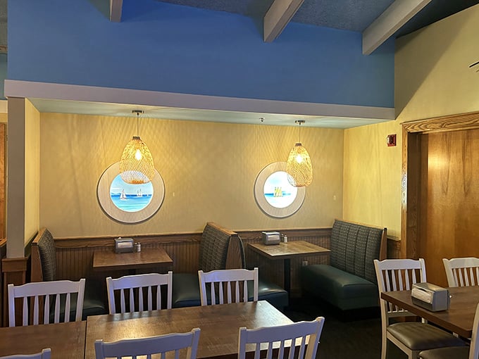 The nautical-themed interior with porthole windows strikes that perfect balance: enough ocean vibes to remind you of seafood without feeling like you're dining inside a fishing net.