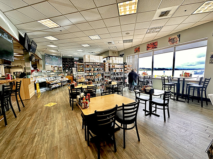 Simple tables, market shelves, and that view&mdash;the dining room says, "We're serious about seafood, not interior design."