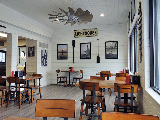 Nautical charm meets lakeside comfort in this dining room where every seat feels like you've scored the captain's table.