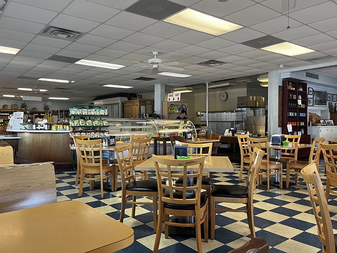 Classic diner atmosphere with checkered floors and wooden chairs that have witnessed decades of pie-induced happiness. The kind of place where calories officially don't count.