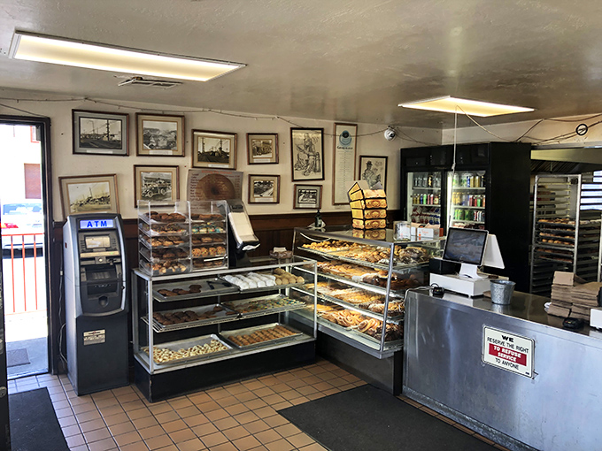 Inside, time stands still as vintage photographs line the walls while display cases showcase the real stars&mdash;donuts that have perfected simplicity.