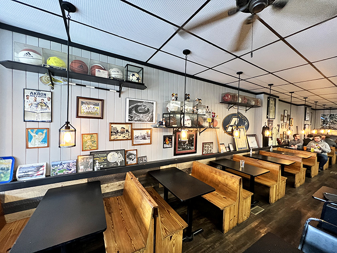Inside, wooden booths and sports memorabilia create that perfect "been-here-forever" vibe where calories don't count and sandwich dreams come true.
