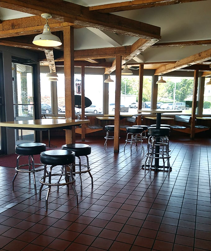 Rustic wooden beams and no-nonsense seating tell you everything: Neptune cares more about what's on your plate than what's on their walls.