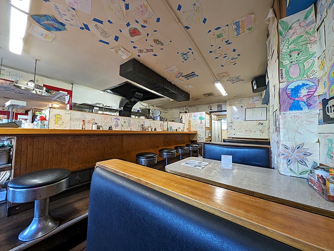 Inside, customer artwork transforms the ceiling into a gallery of napkin masterpieces, giving new meaning to "food for thought."