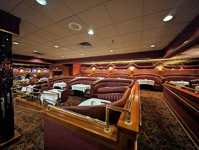 The high-backed leather booths aren't just comfortable &ndash; they're confessionals where countless Minnesotans have professed their love for perfectly charred beef.