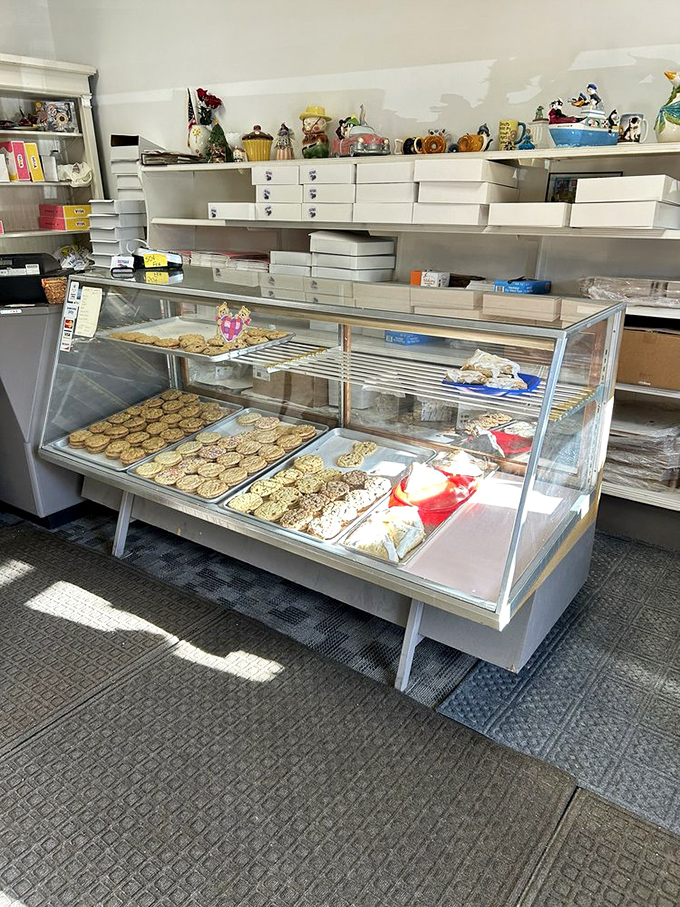 No fancy display cases needed when what's inside them is this good. The collection of vintage figurines watches over decades of donut perfection.