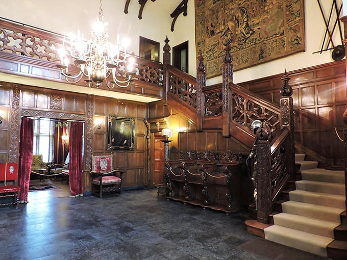 The great hall welcomes visitors with soaring ceilings and intricate woodwork&mdash;medieval craftsmanship that somehow survived an ocean voyage and reassembly.