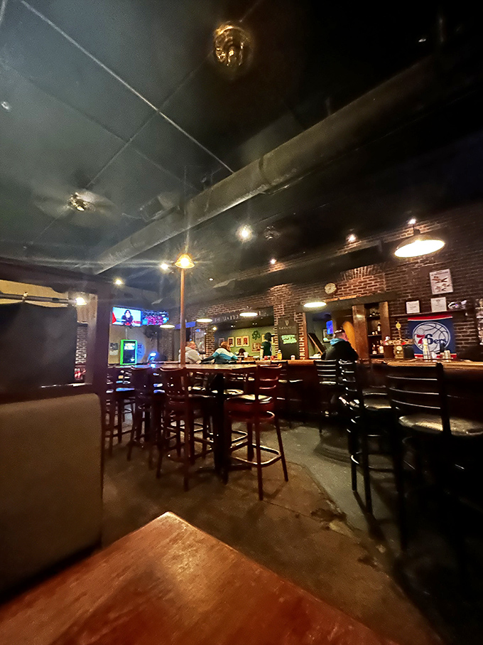 A classic American pub ambiance with exposed brick, warm lighting, and a bar that's witnessed more political debates than C-SPAN.
