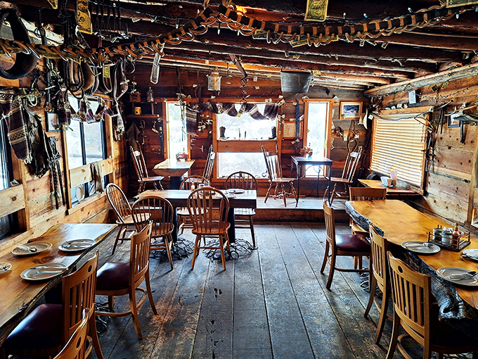 Where bridles become chandeliers and history hangs from every beam. The dining room feels like stepping into a different era of American hospitality.