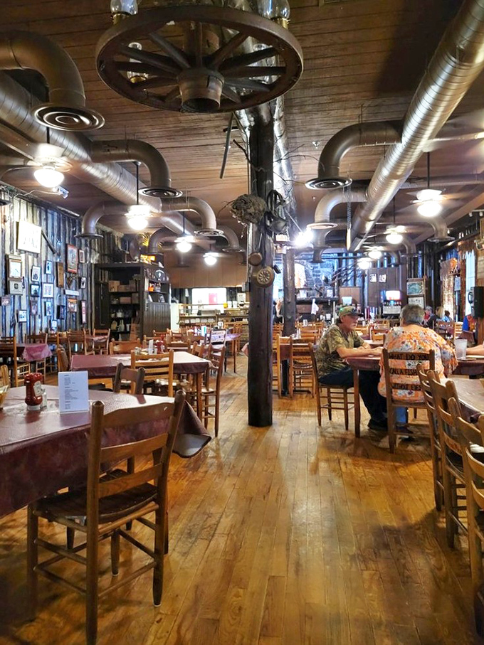 Wagon wheels overhead and wooden charm throughout&mdash;this isn't interior decorating, it's time travel with better food.