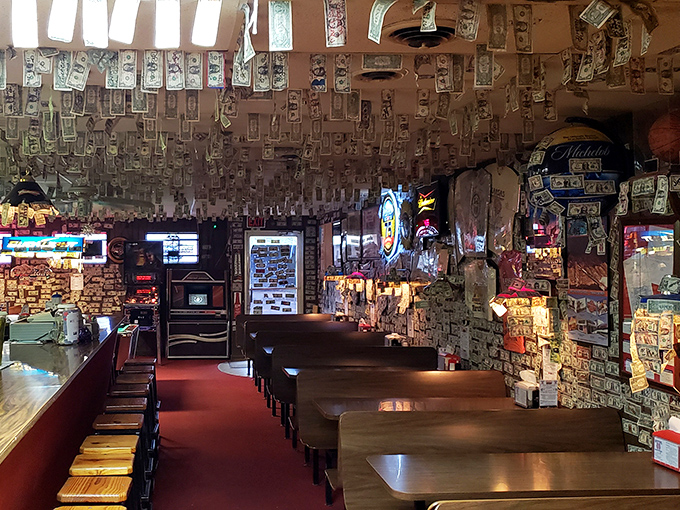 Money talks, but at Guy & Mae's it also decorates! Thousands of dollar bills from satisfied customers create the most lucrative wallpaper in Kansas, a testament to memorable meals past.