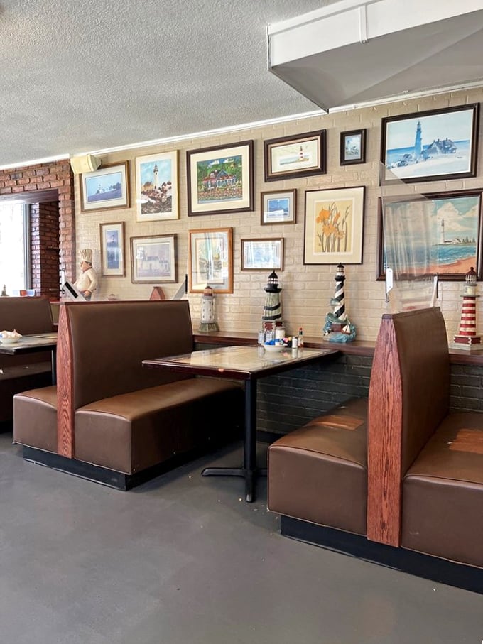 Lighthouse artwork adorns cream-colored walls above brown vinyl booths&mdash;nautical decor that somehow feels perfectly at home in landlocked Kansas.