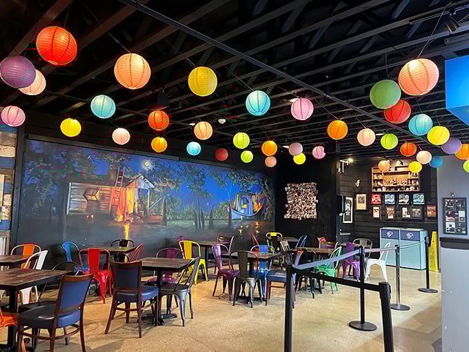 Step inside and you're greeted by a kaleidoscope of colorful lanterns, vibrant chairs, and the unmistakable aroma of properly smoked meat.