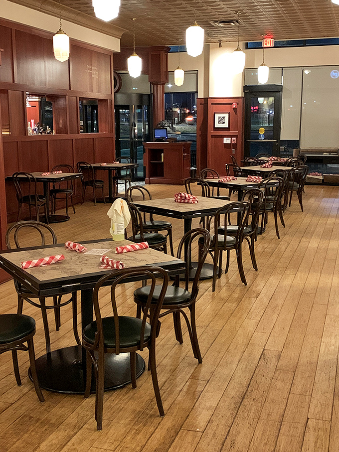 The warm wood paneling and classic bentwood chairs create an atmosphere that's both rustic and refined&mdash;like a Montana lodge that went to finishing school.