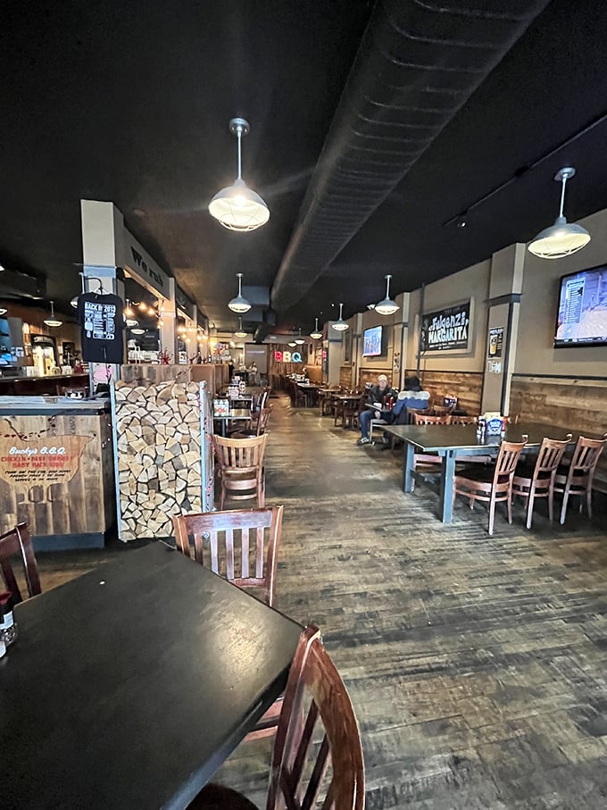 Industrial-chic meets smokehouse comfort inside Smoke Street, where the wooden tables practically whisper, "Stay awhile, the brisket is worth it."