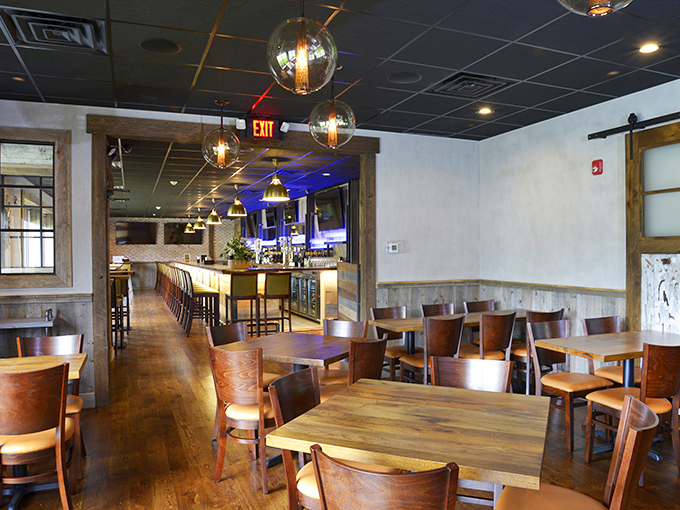 The dining room strikes that perfect balance between rustic and refined, like a lumberjack who secretly has a PhD in interior design.