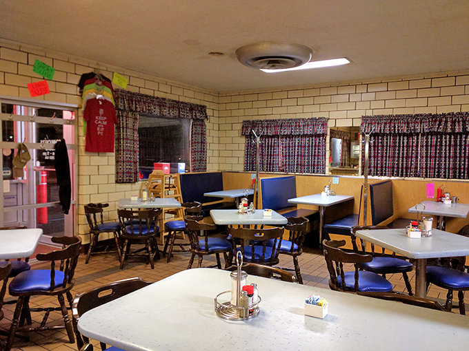 Time-capsule interiors like this aren't designed—they're earned. Those tile walls have witnessed decades of Toledo conversations and countless coffee refills.