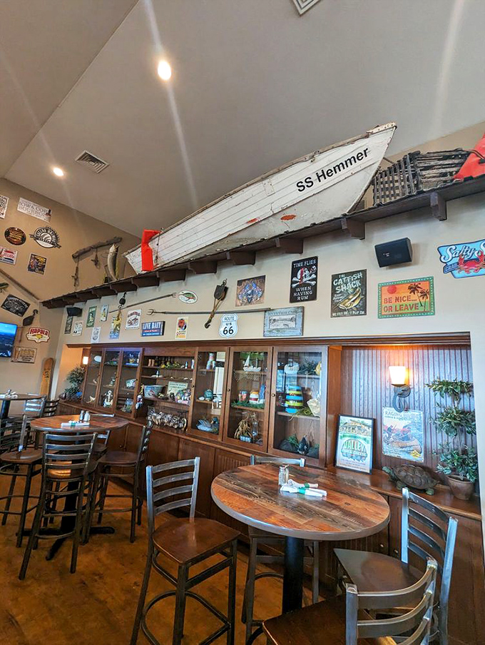 The SS Hemmer boat hangs overhead, a nautical guardian watching diners embark on culinary voyages without ever leaving Iowa.