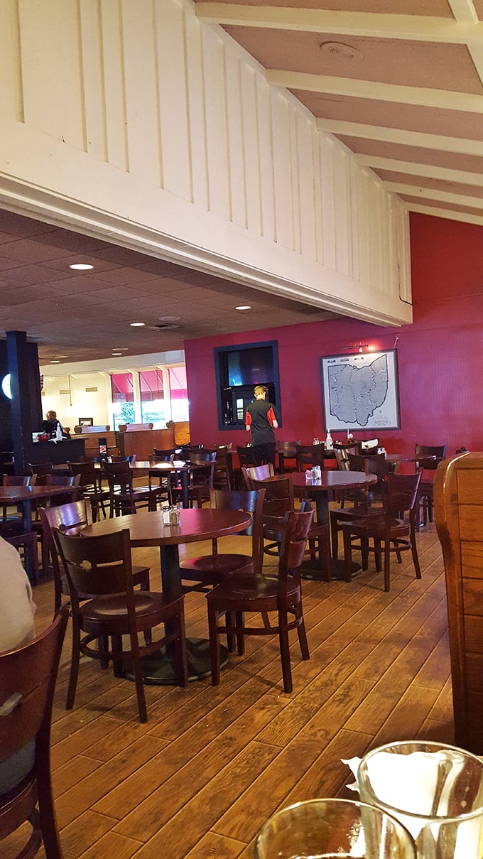 Red walls, wooden floors, and that Ohio map on the wall &ndash; this isn't just dining, it's a warm Buckeye hug with table service.