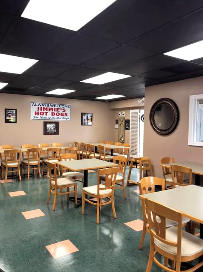 Simple wooden chairs and clean tables await the faithful. No fancy chandeliers needed when the star of the show fits in a paper wrapper.