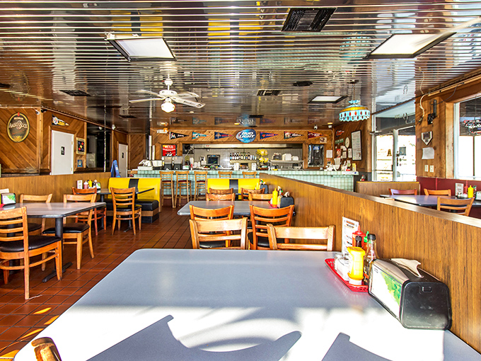 Wood paneling, ceiling fans, and no-nonsense tables &ndash; Spanky's interior is a time capsule where calories don't count and conversations flow as freely as the cheese.