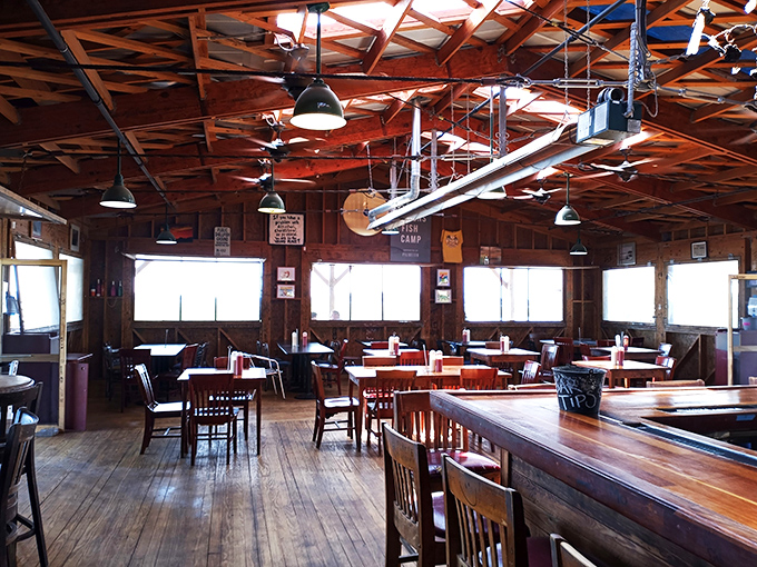 Rustic wooden beams and simple tables tell you everything: this place cares more about what's on your plate than what's on their walls.